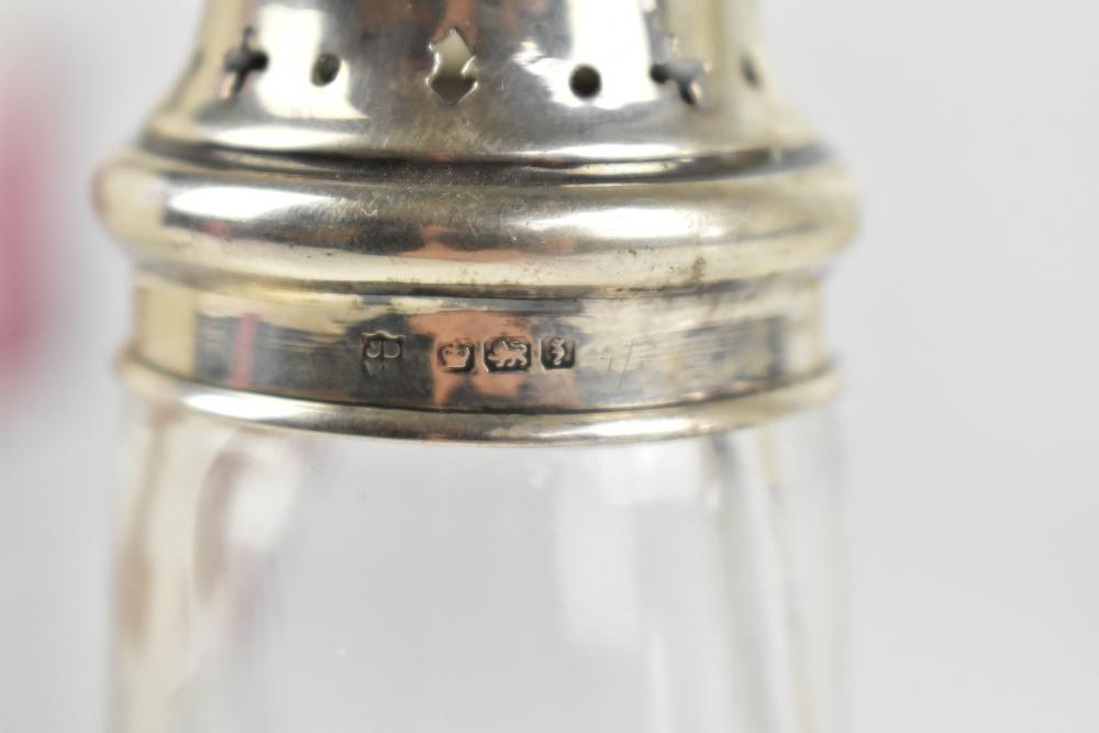 JAMES DEAKIN & SONS; a George V cut glass sugar castor with hallmarked ...