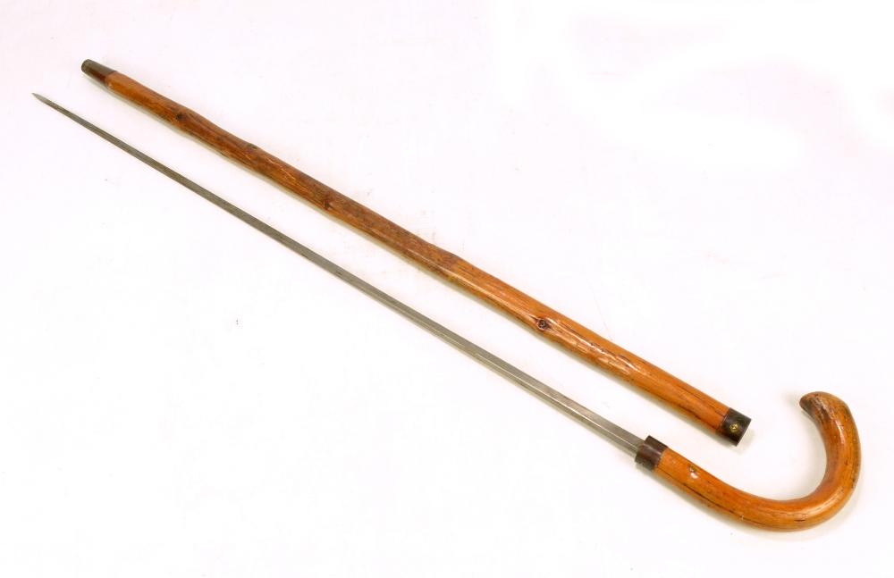 A late Victorian sword stick with square sectioned tapering blade ...