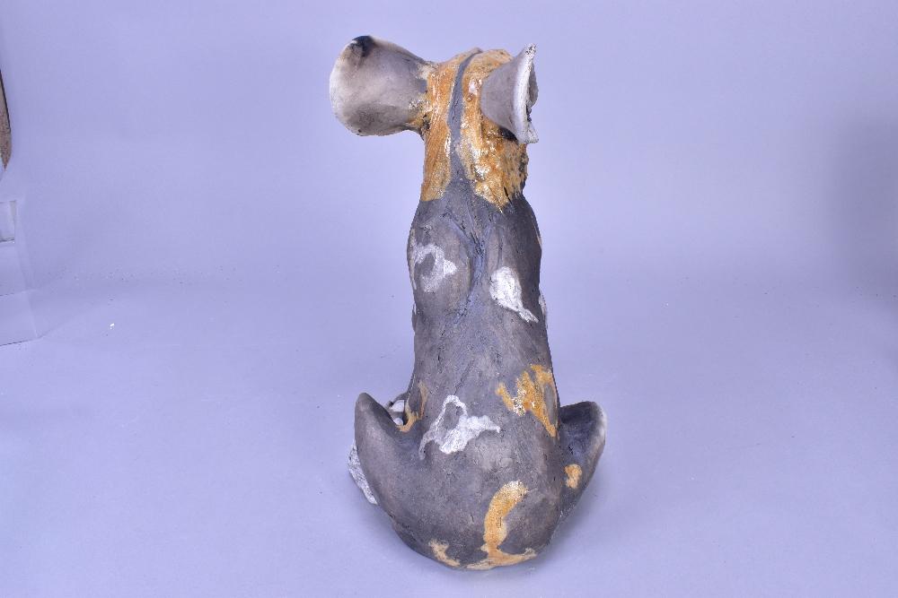 NICK MACKMAN (born 1972); a raku sculpture, 'Wild Dog Pup Looking Up ...