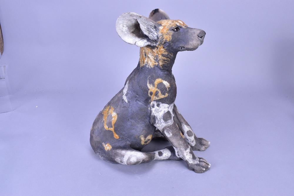 NICK MACKMAN (born 1972); a raku sculpture, 'Wild Dog Pup Looking Up ...