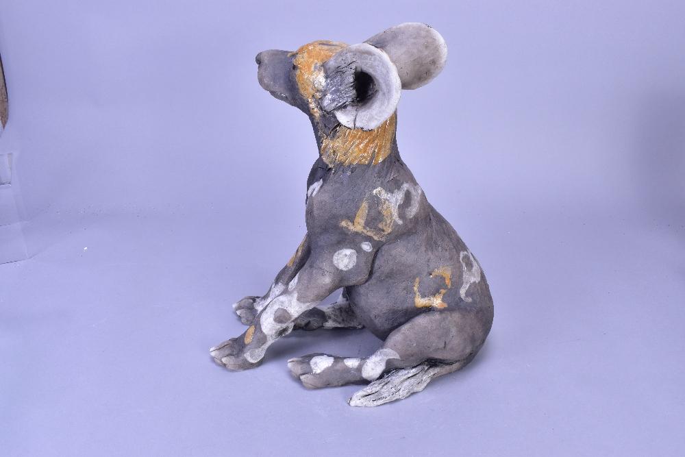 NICK MACKMAN (born 1972); a raku sculpture, 'Wild Dog Pup Looking Up ...