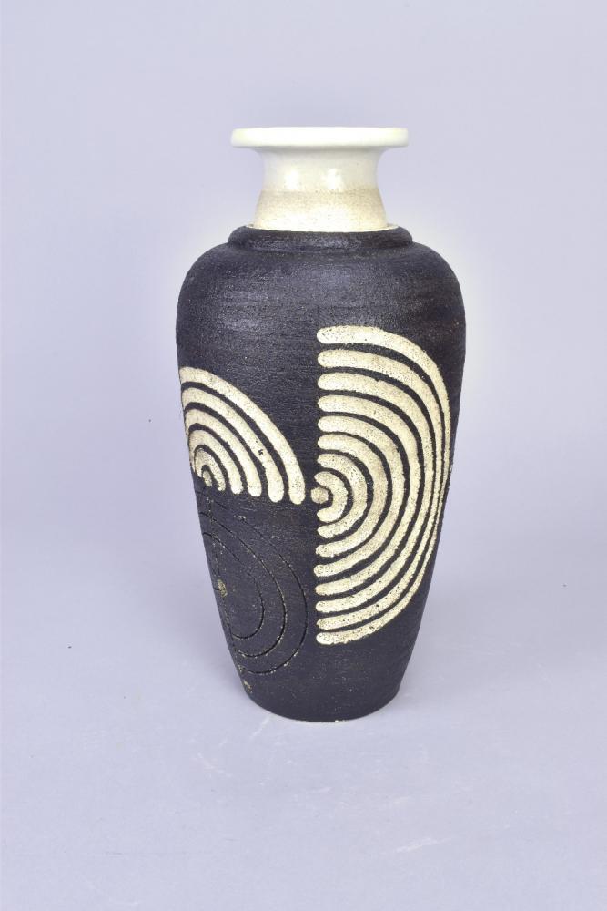 PATRICK OATES (born 1948); a stoneware bottle with incised decoration ...