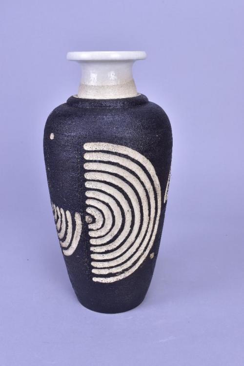 PATRICK OATES (born 1948); a stoneware bottle with incised decoration ...