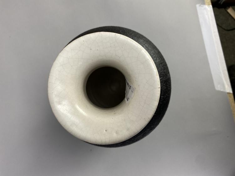 PATRICK OATES (born 1948); a stoneware bottle with incised decoration ...