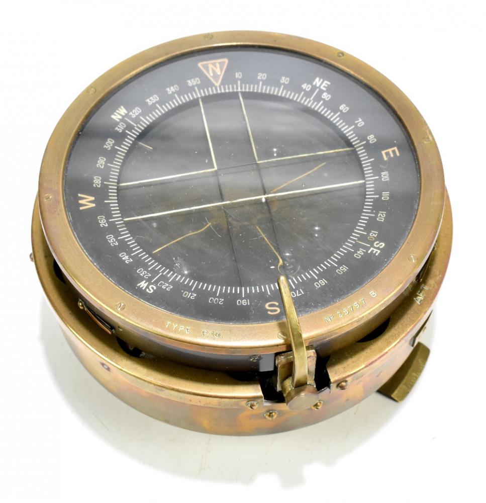 A Lancaster Bomber brass cased compass with plaque bearing military ...