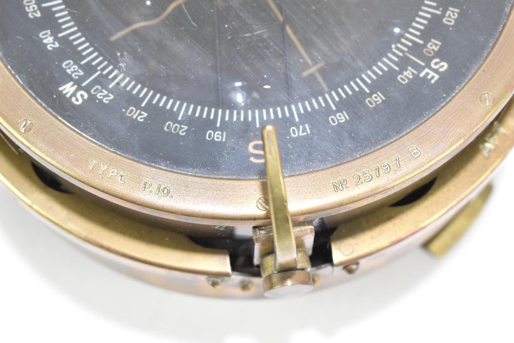 A Lancaster Bomber brass cased compass with plaque bearing military ...