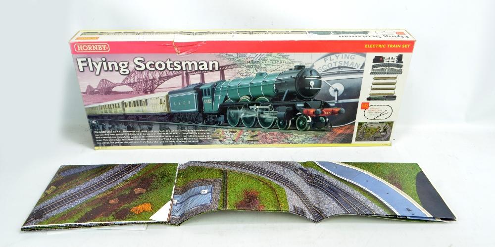 A boxed Hornby R1039 'Flying Scotsman' 00 gauge electric train set with fold-out track plan ...