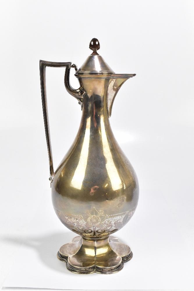 FREDERICK ELKINGTON; a Victorian hallmarked silver ewer with chased ...