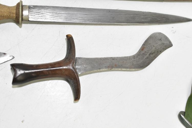 A group of North African/Middle Eastern blades including jambiyas, one ...