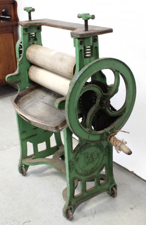 A large cast and wrought iron vintage mangle, height 131cm. | Adam ...