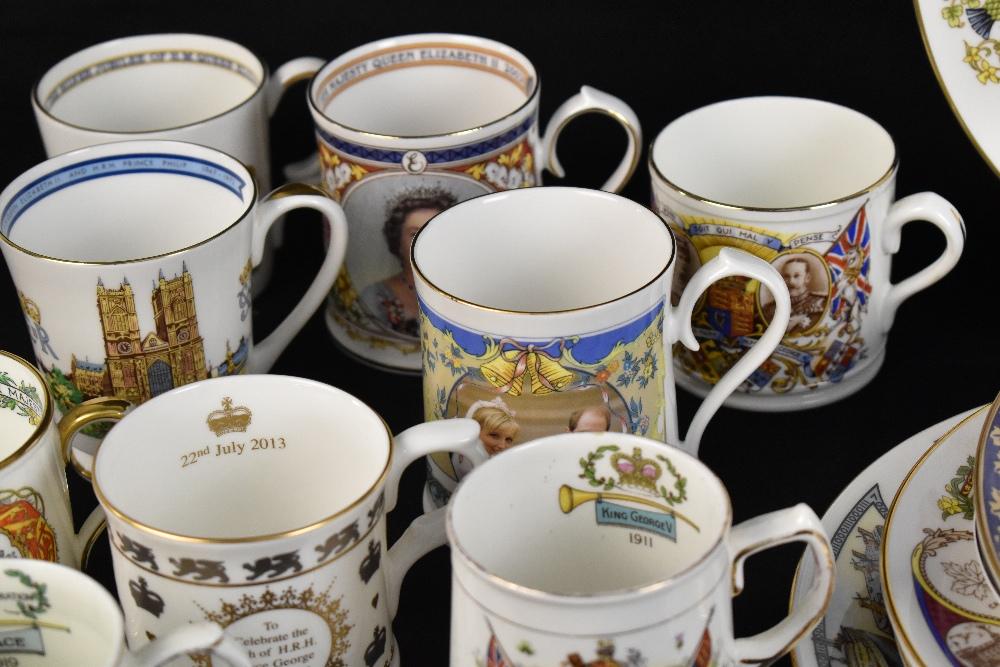 A selection of 20th century Royal Commemorative mugs and plates, etc ...
