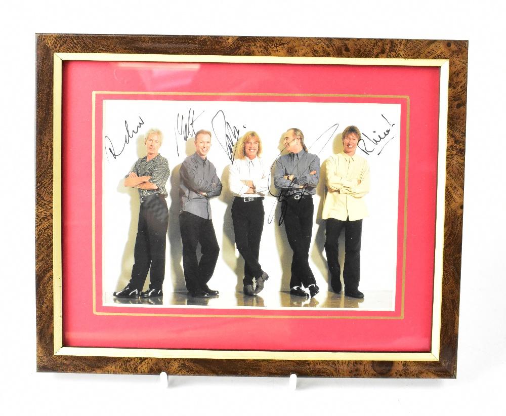 ROCK & POP; a group of five autographed promotional pictures of Dannii ...