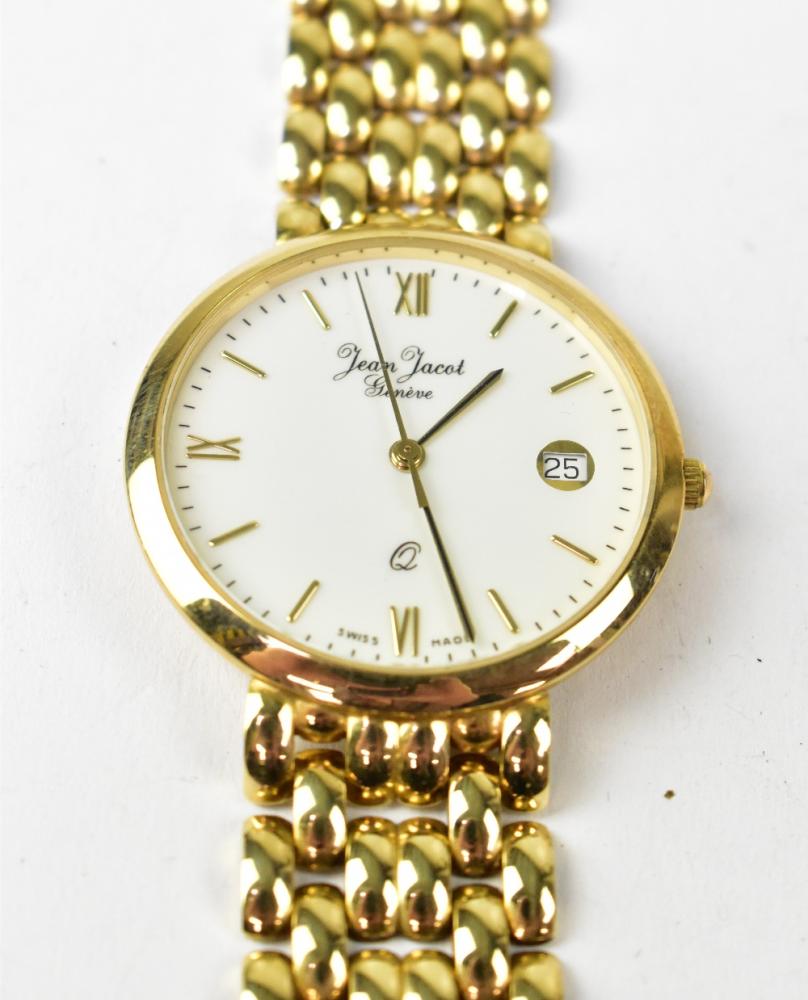 JEAN JACOT GENÈVE; a gentlemen's 9ct yellow gold dress watch, the white ...