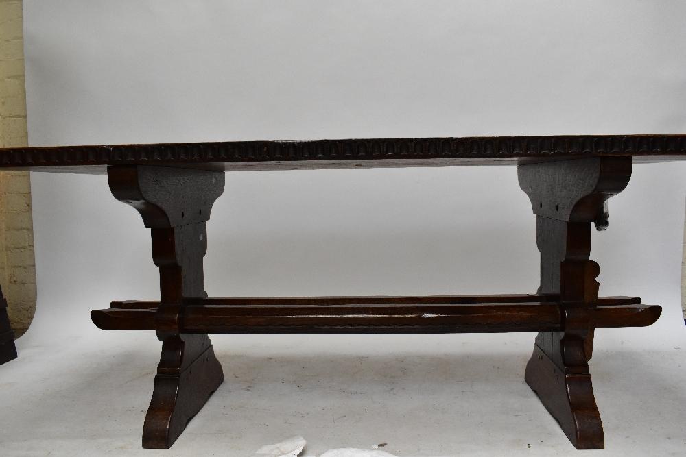 A reproduction oak refectory table on baluster feet, width 183cm, depth ...
