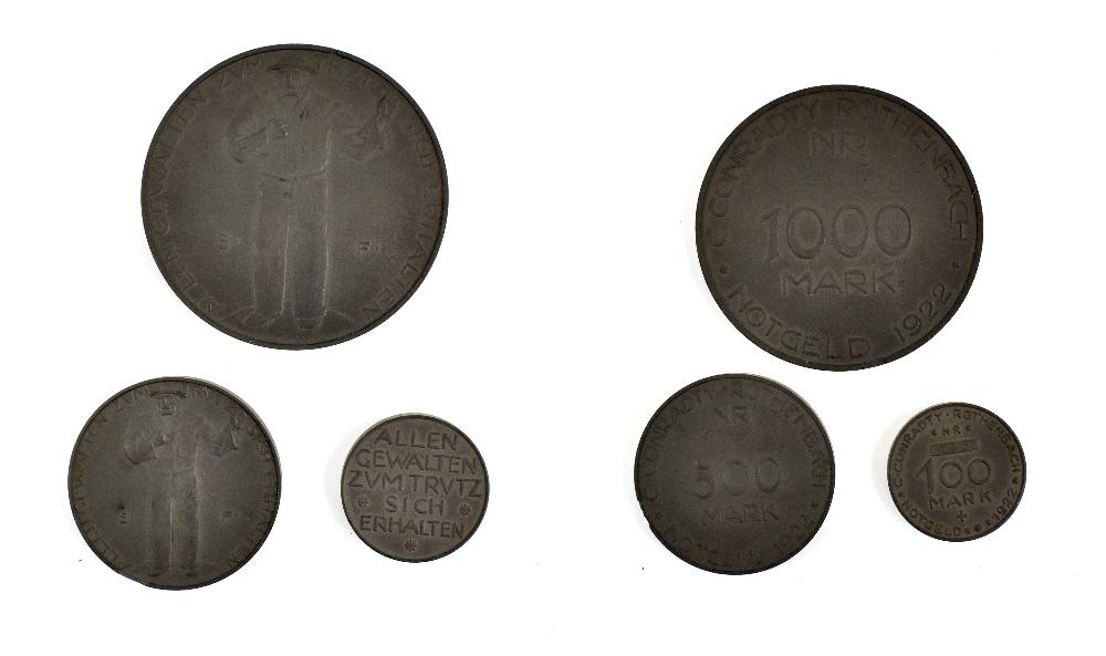 Three German 1922 Notgeld emergency issue coins formed of compressed ...