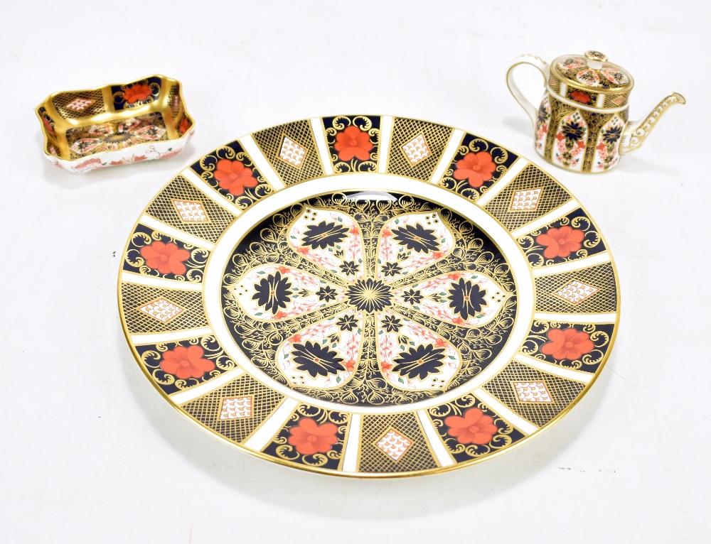 ROYAL CROWN DERBY; three pieces of 1128 pattern Imari, comprising ...