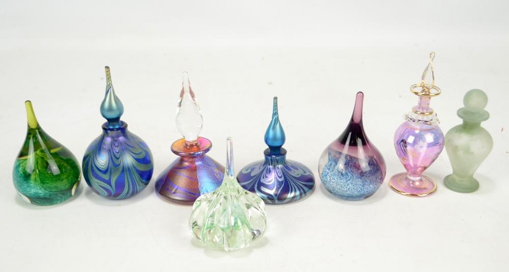 Five glass scent bottles including two Okra iridescent and one ...