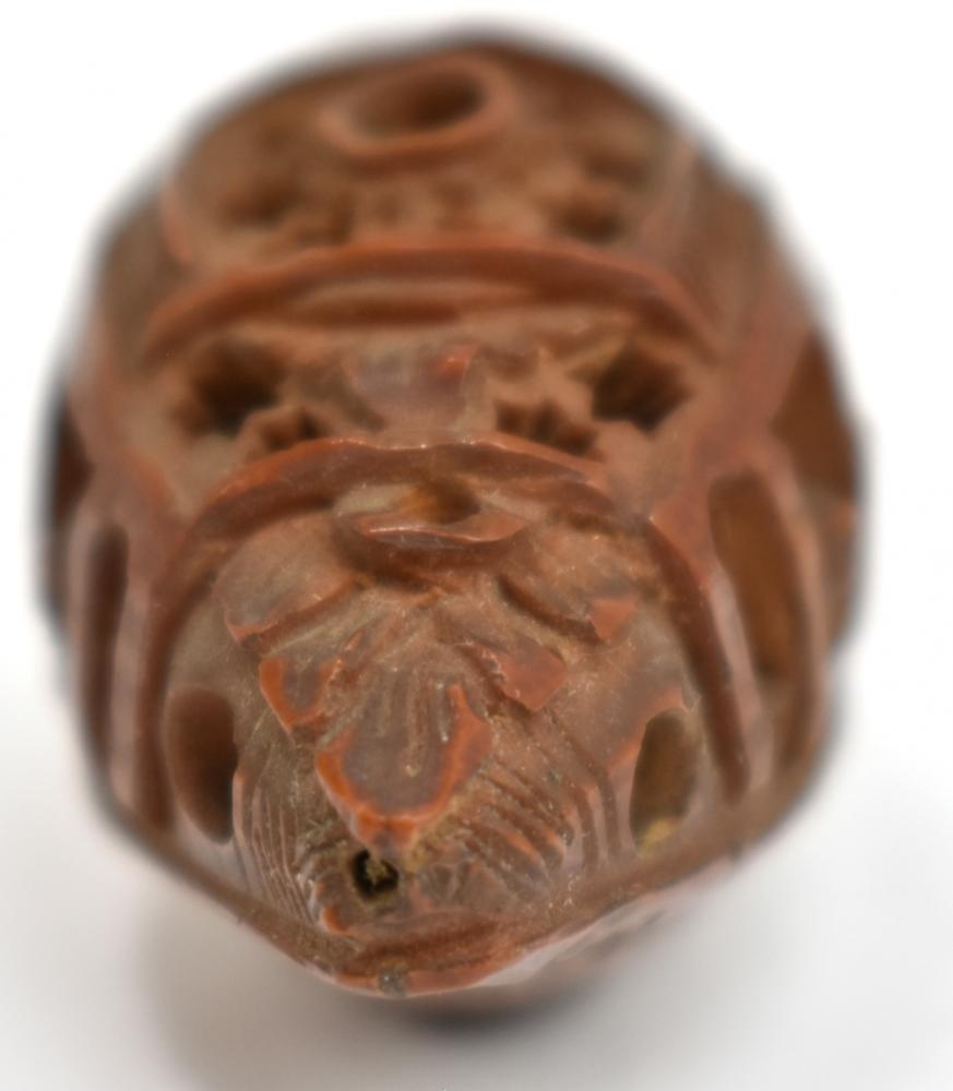 A 19th century Chinese carved hediao nut in the form of a boat, length ...